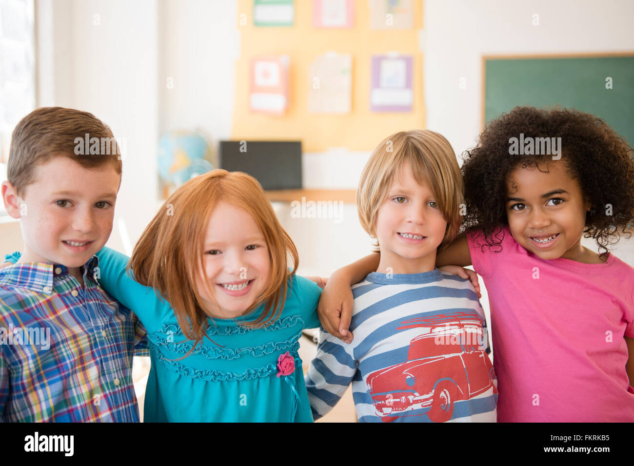 Students smiling in classroom Stock Photo - Alamy