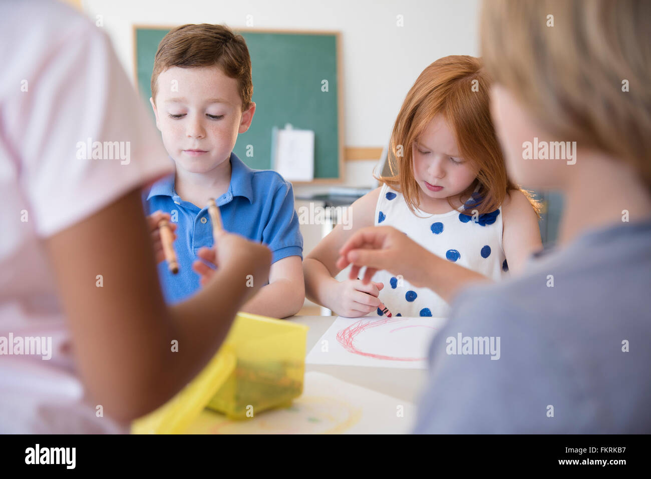 Students drawing in classroom Stock Photo - Alamy