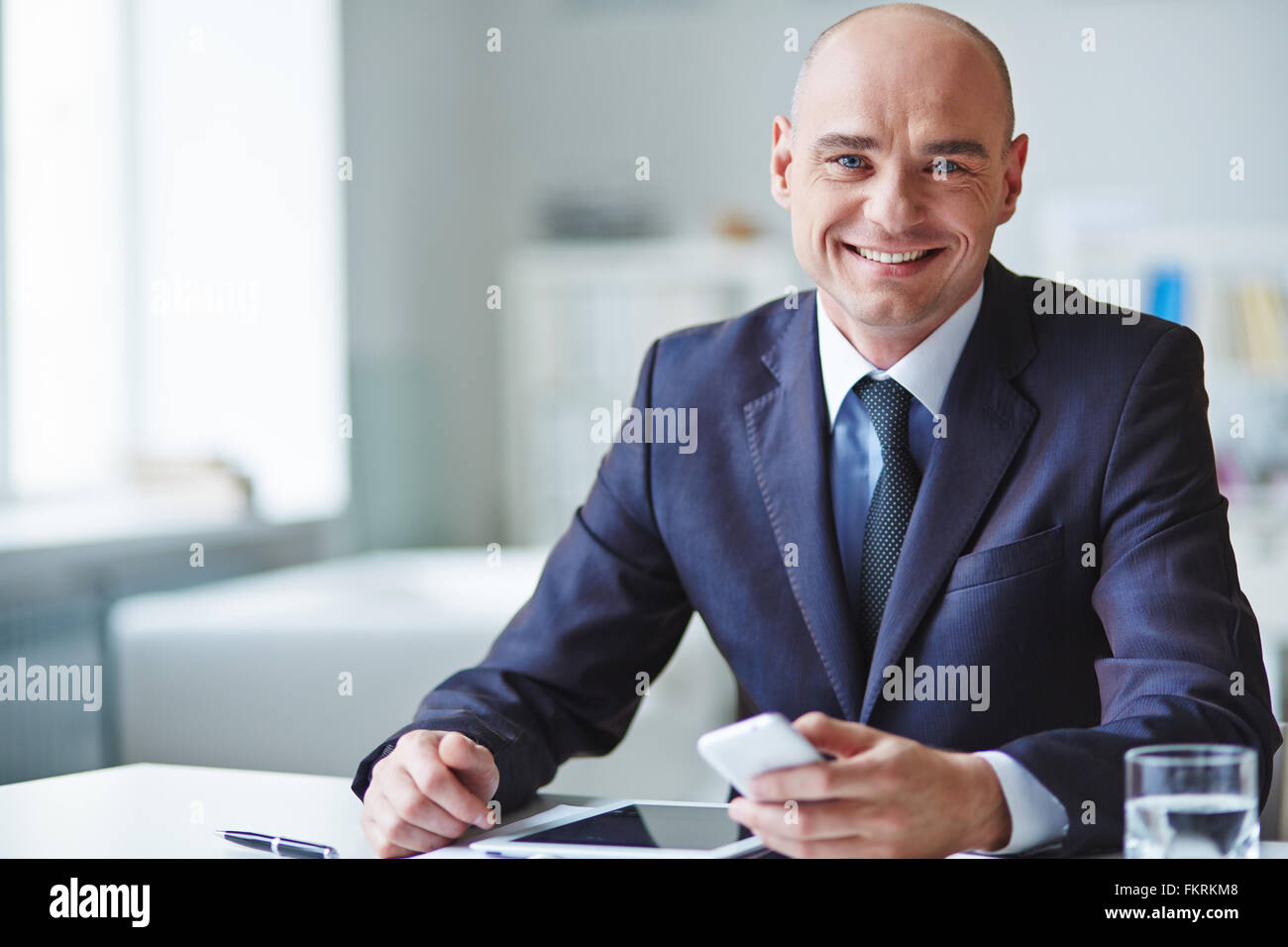 Portrait of a ceo looking at camera and smiling Stock Photo - Alamy