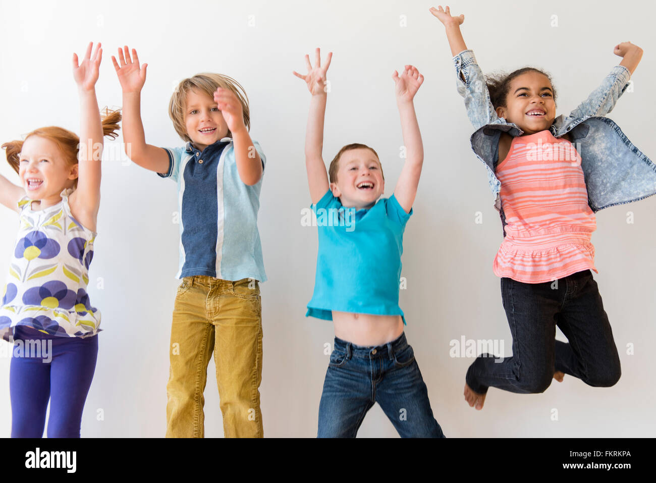 Children jumping for joy Stock Photo - Alamy