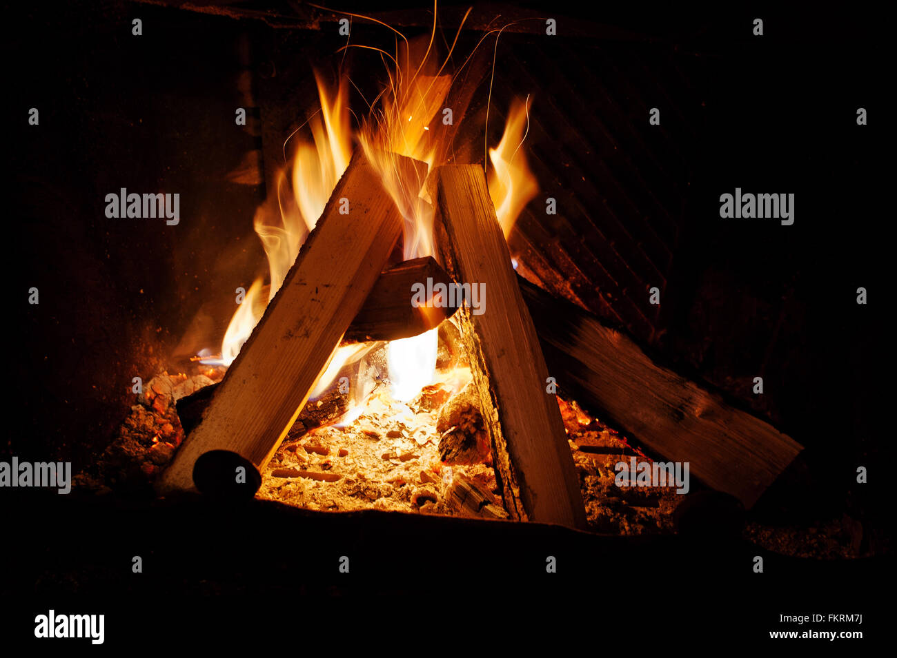 Background warm fire in the fireplace home Stock Photo - Alamy