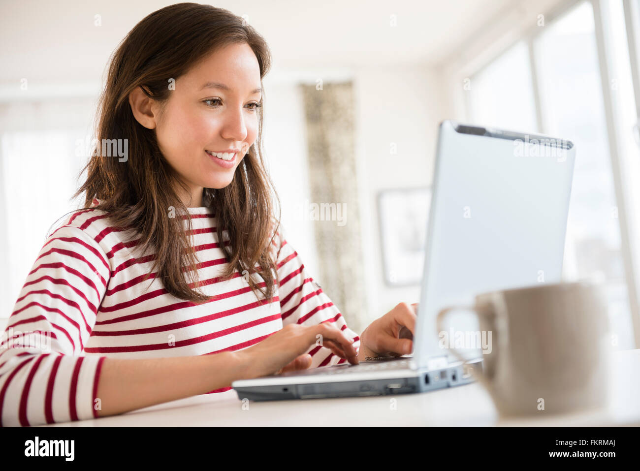 Person using laptop hi-res stock photography and images - Alamy