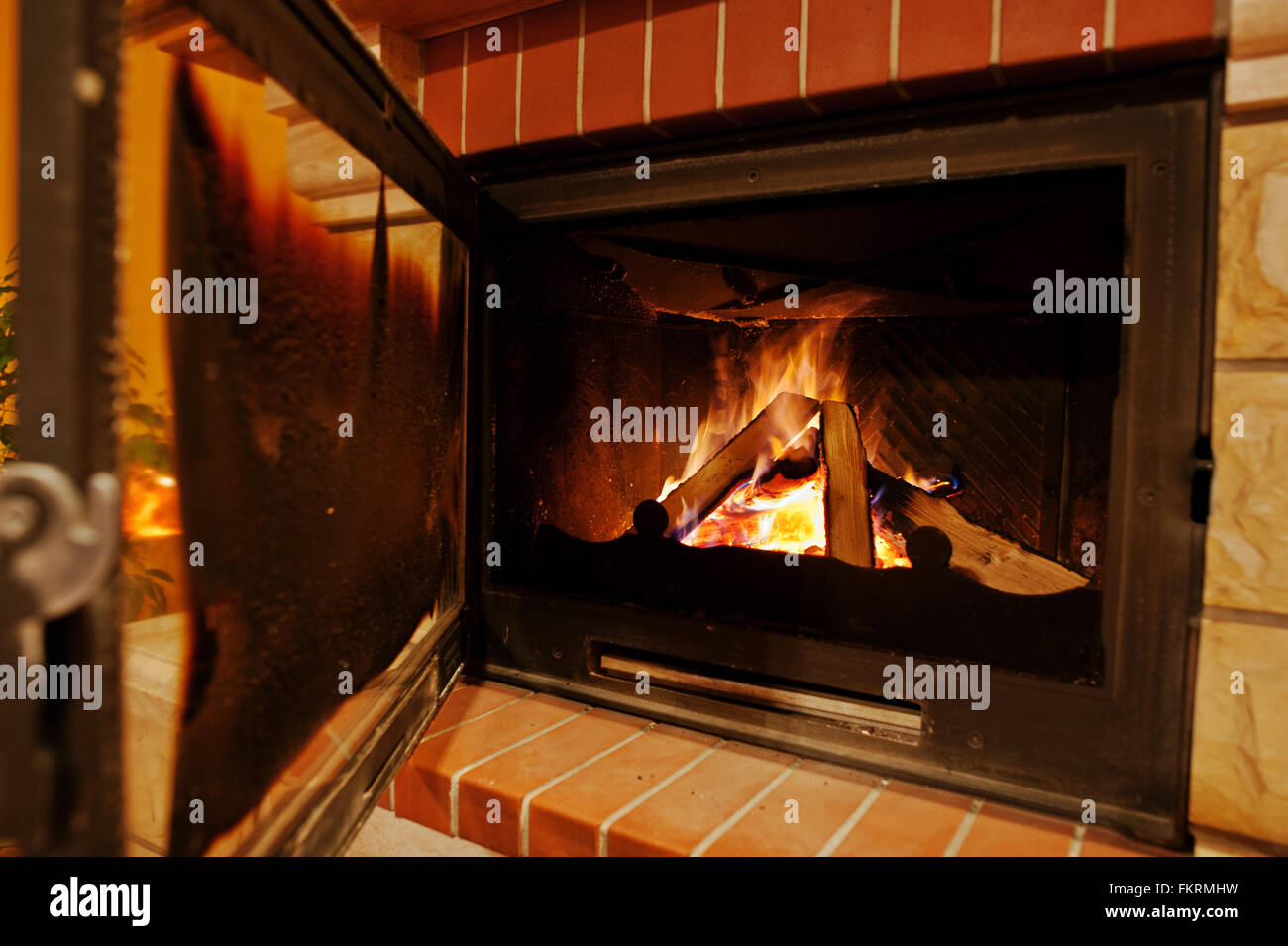 Background warm fire in the fireplace home Stock Photo - Alamy
