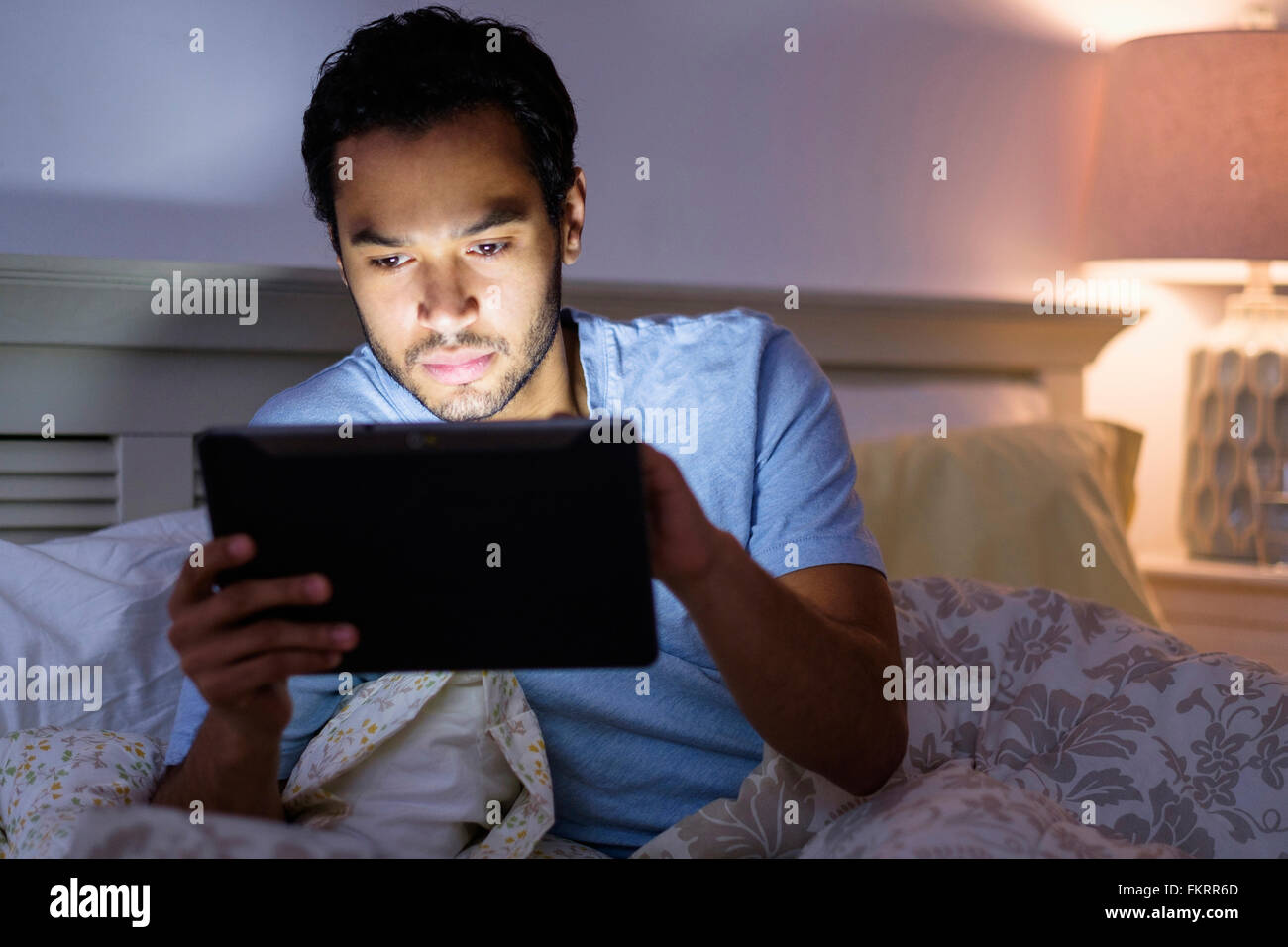 Man tablet dark hi-res stock photography and images - Alamy