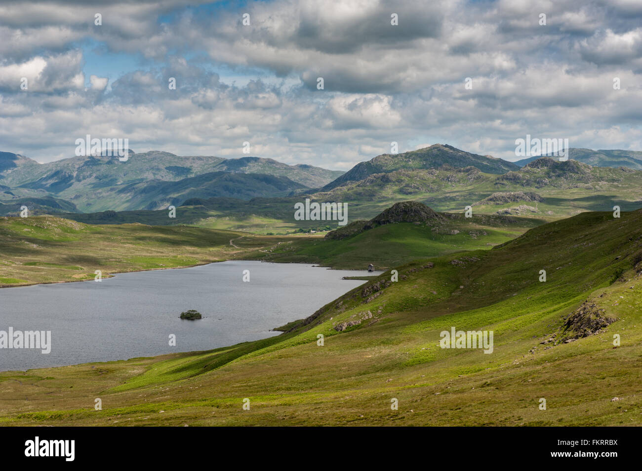 Devoke Water and the Western Fells of Cumbria Stock Photo - Alamy