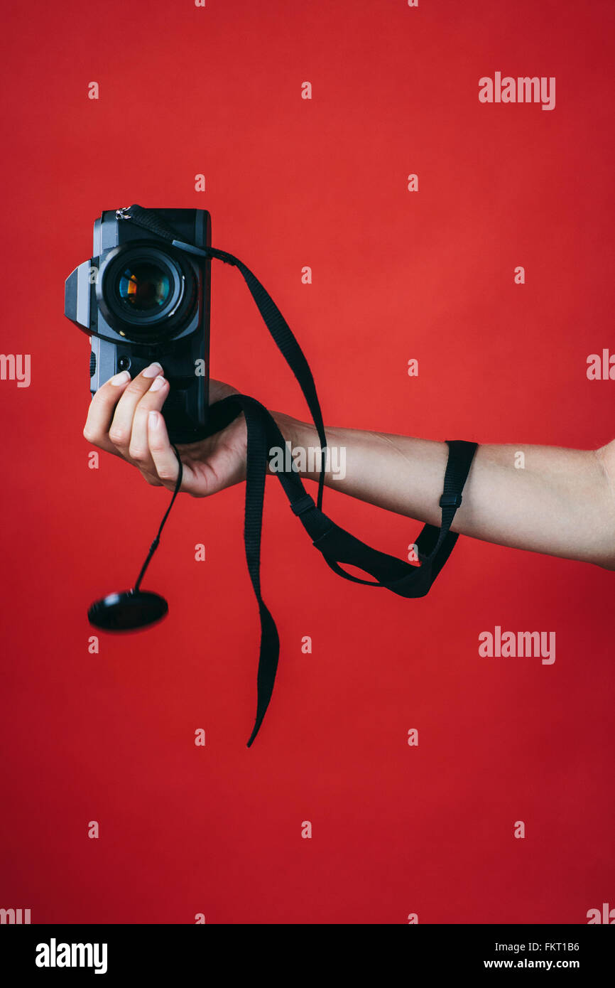 Hand woman holding camera hi-res stock photography and images - Alamy