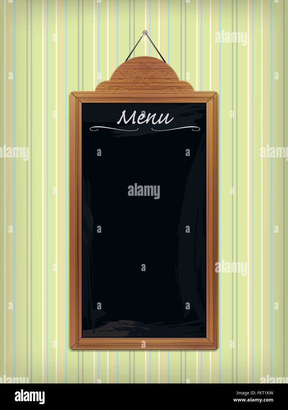 Blank wooden menu blackboard with ornamental carvings hanging at wall ...