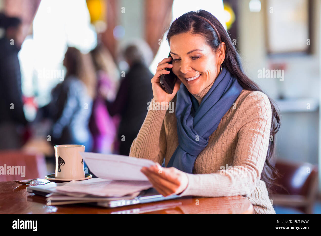 Woman cafe cell hi-res stock photography and images - Alamy