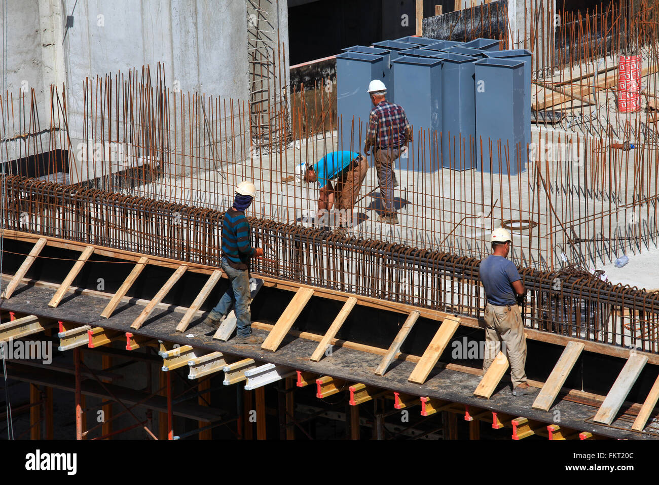 New skyscraper Construction site with workers at the business center of ...