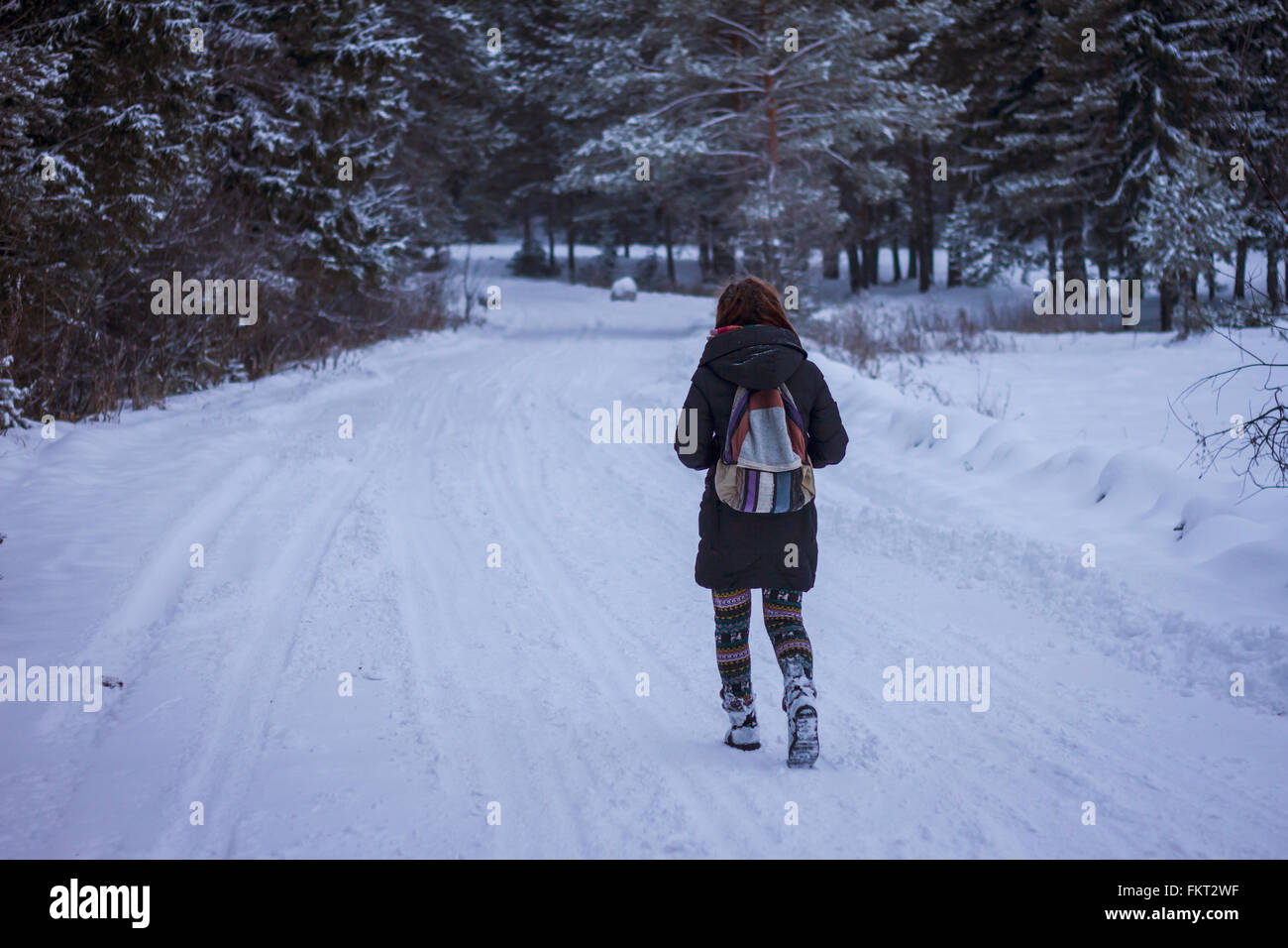 Female walking on rural road hi-res stock photography and images - Alamy