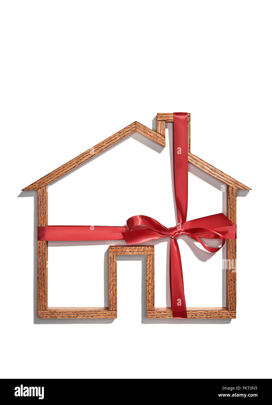House shape wrapped in ribbon Stock Photo - Alamy
