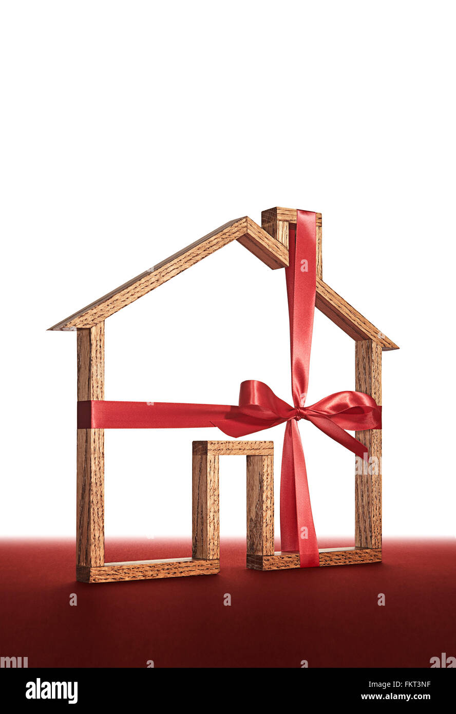 House shape wrapped in ribbon Stock Photo - Alamy
