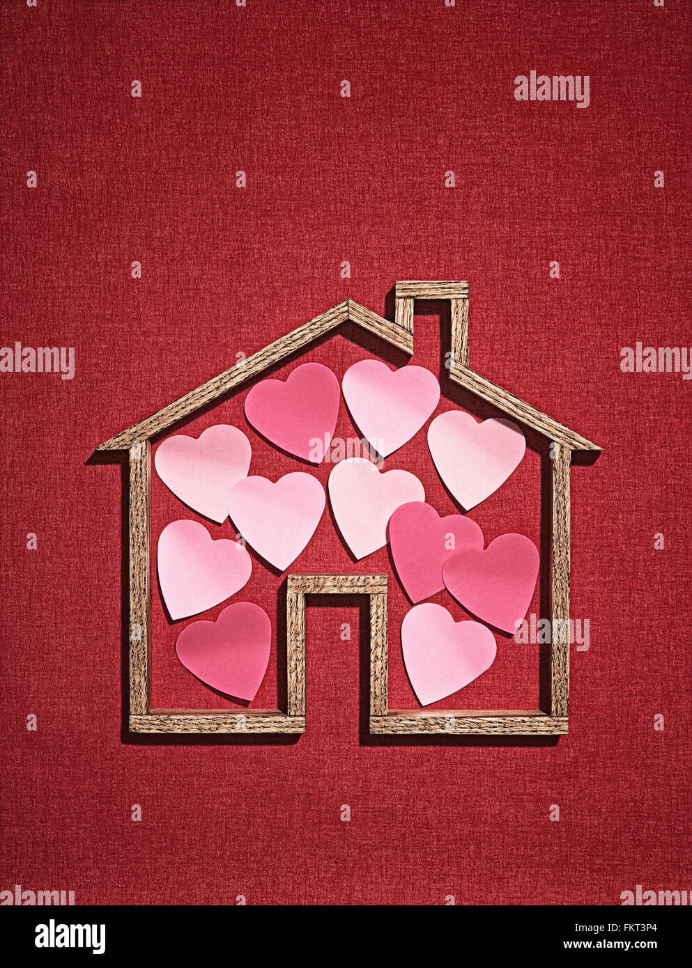 House shape with cutout hearts Stock Photo - Alamy
