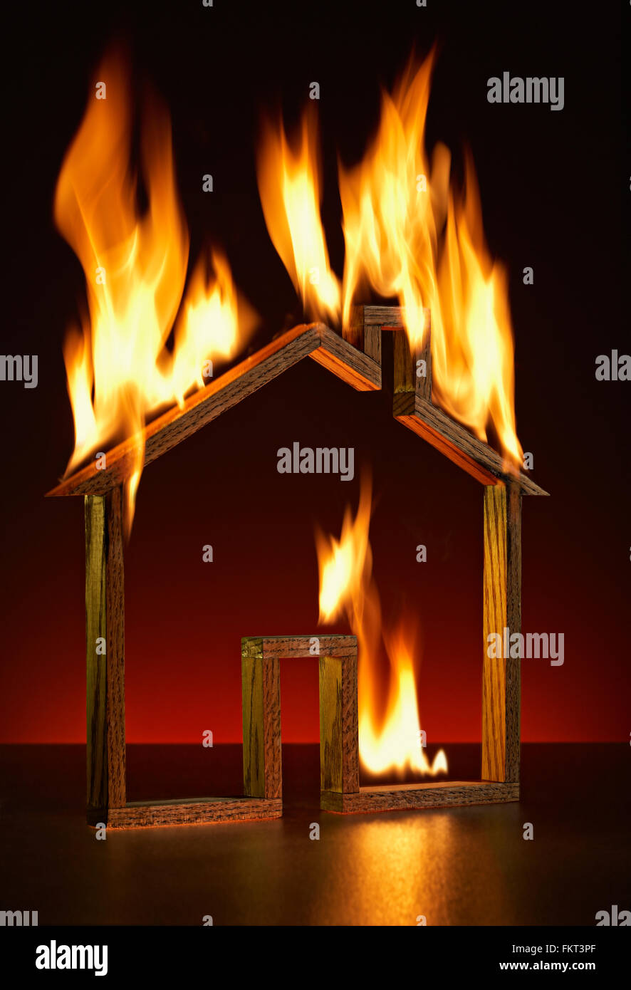 House shape on fire Stock Photo - Alamy