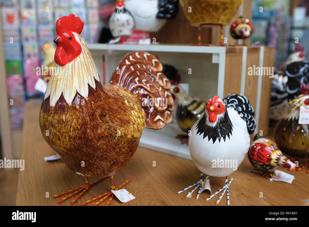 Ceramic chickens on display in home decor store Stock Photo - Alamy