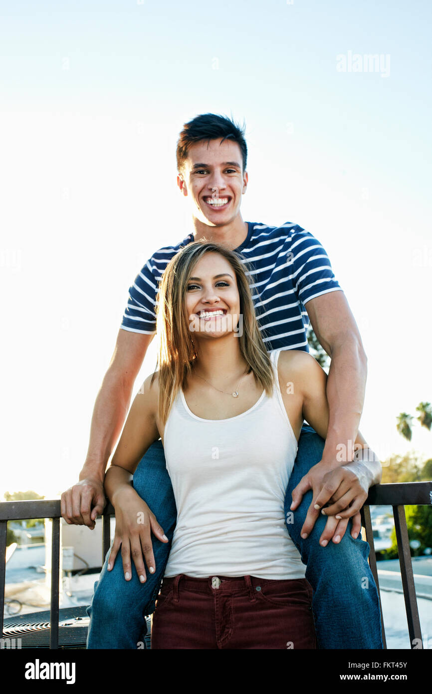 Couple smiling outdoors Stock Photo - Alamy