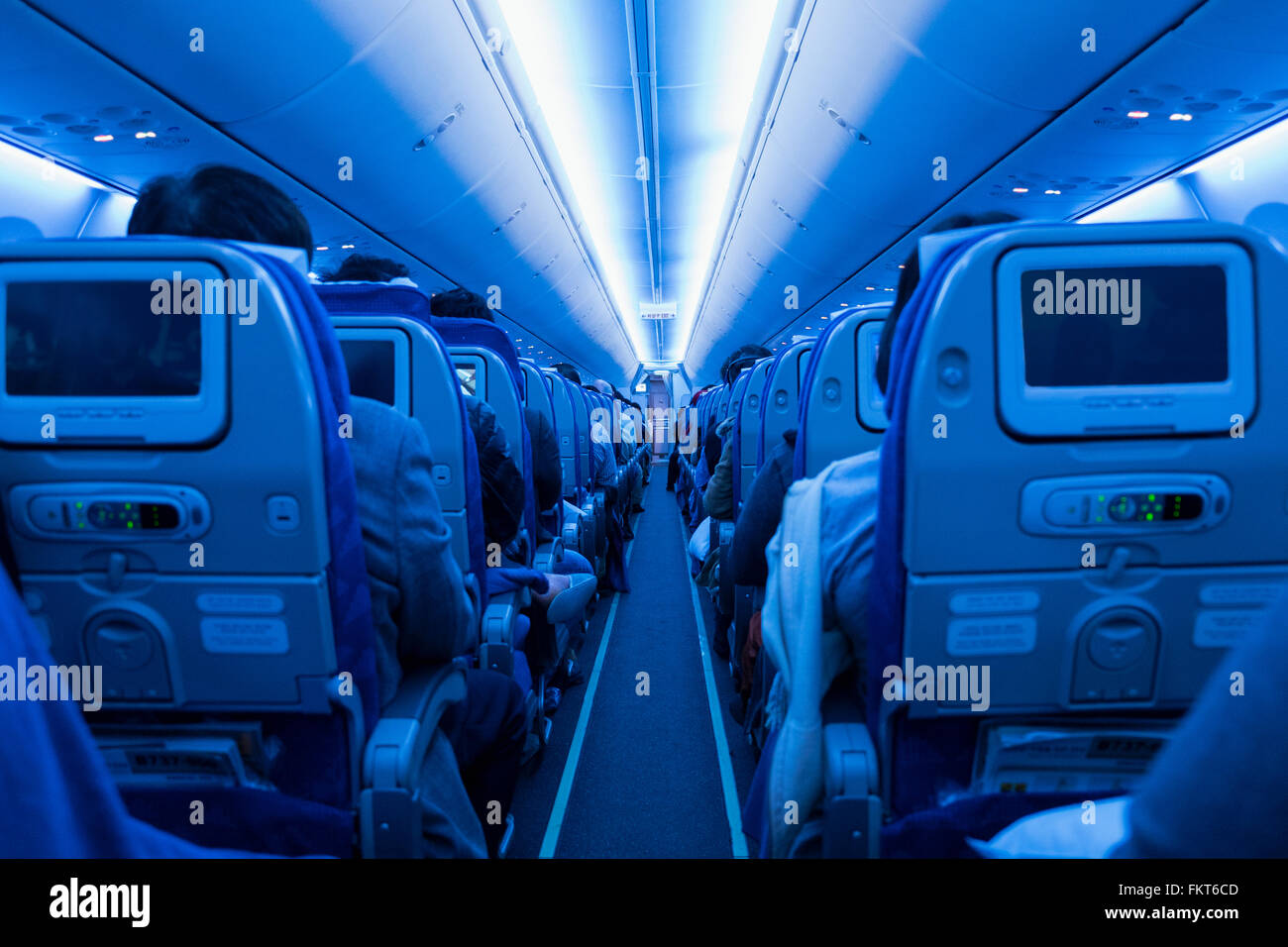 Airplane aisle night hi-res stock photography and images - Alamy