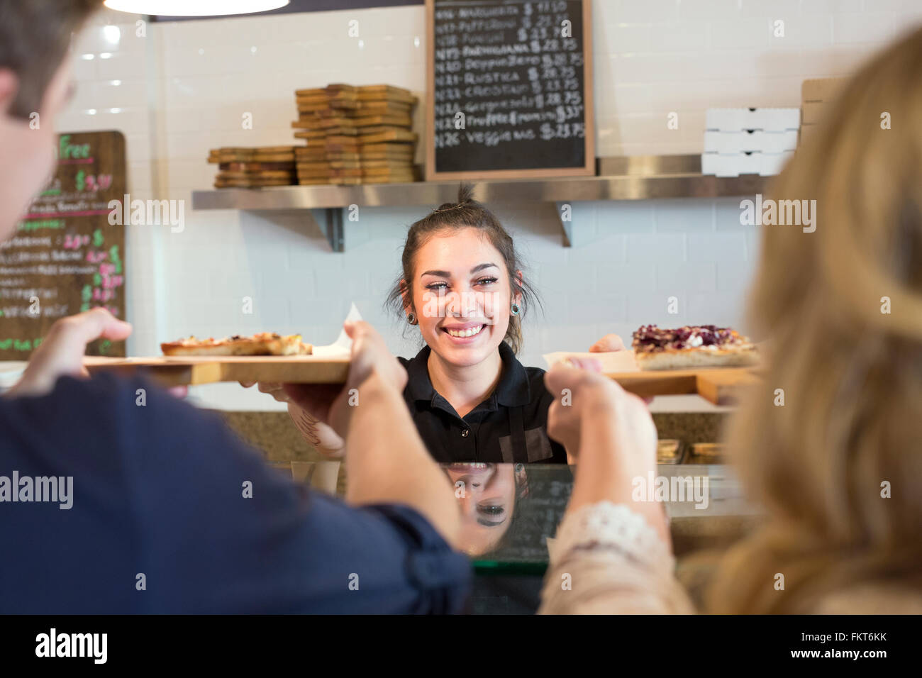 Handing over food hi-res stock photography and images - Alamy