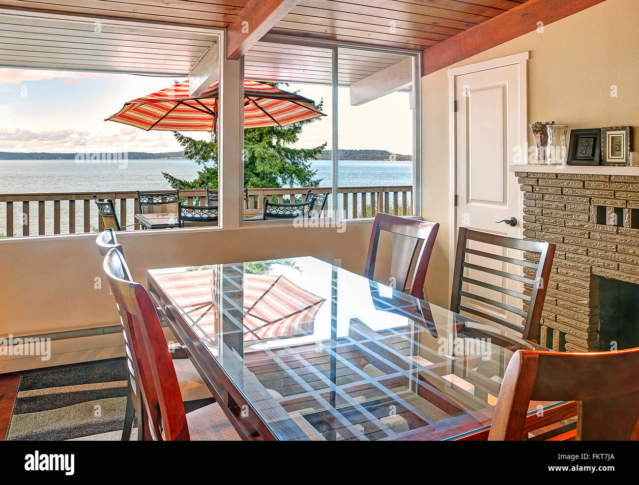 Window with lake view in dining room Stock Photo - Alamy