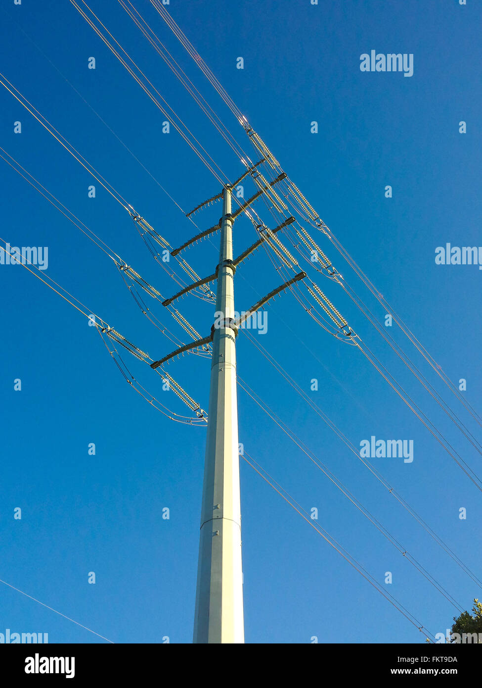 Modern electric tower on blue sky Stock Photo - Alamy