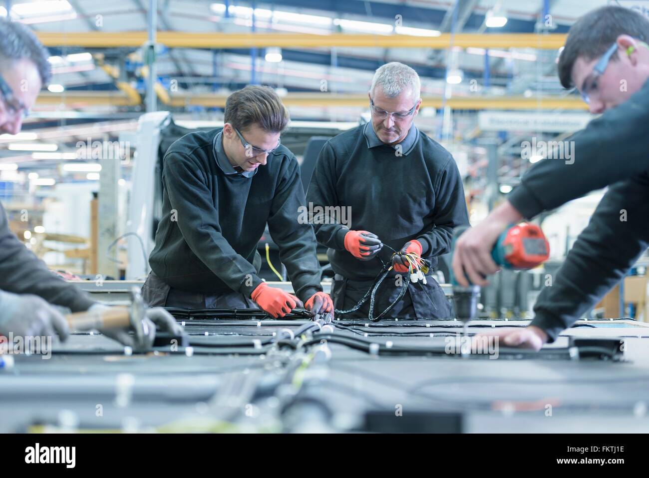 Production workers hi-res stock photography and images - Alamy