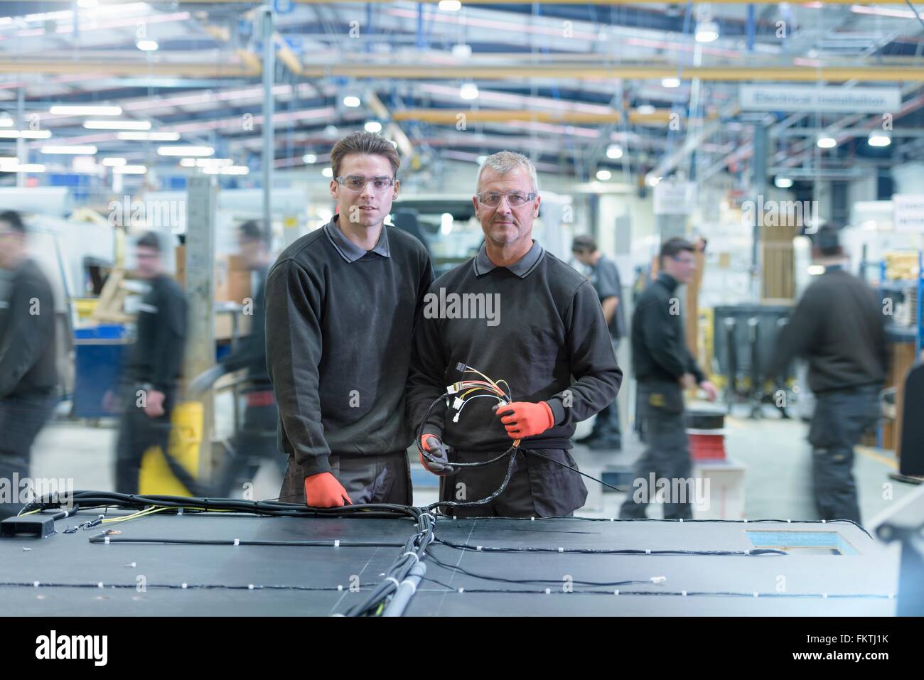 Production workers hi-res stock photography and images - Alamy
