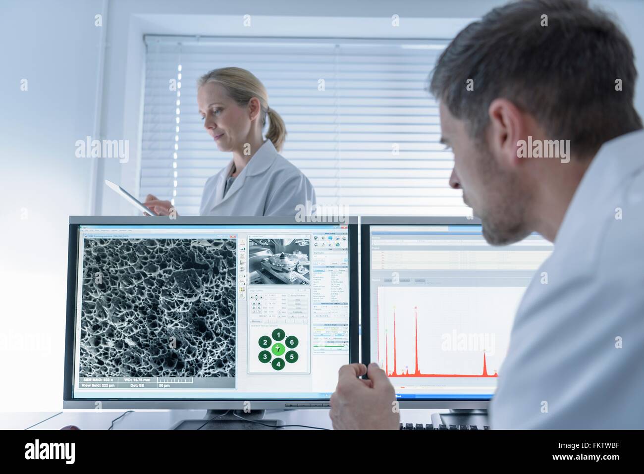 Scientist using an electron microscope hi-res stock photography and ...