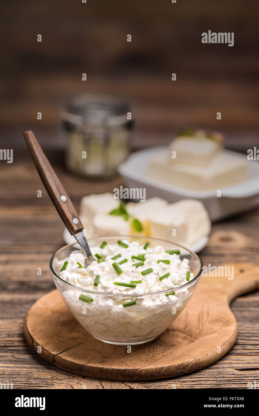 A bowl of cottage cheese with chives Stock Photo - Alamy