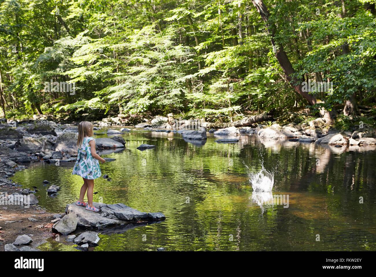 Throwing water girl hi-res stock photography and images - Alamy