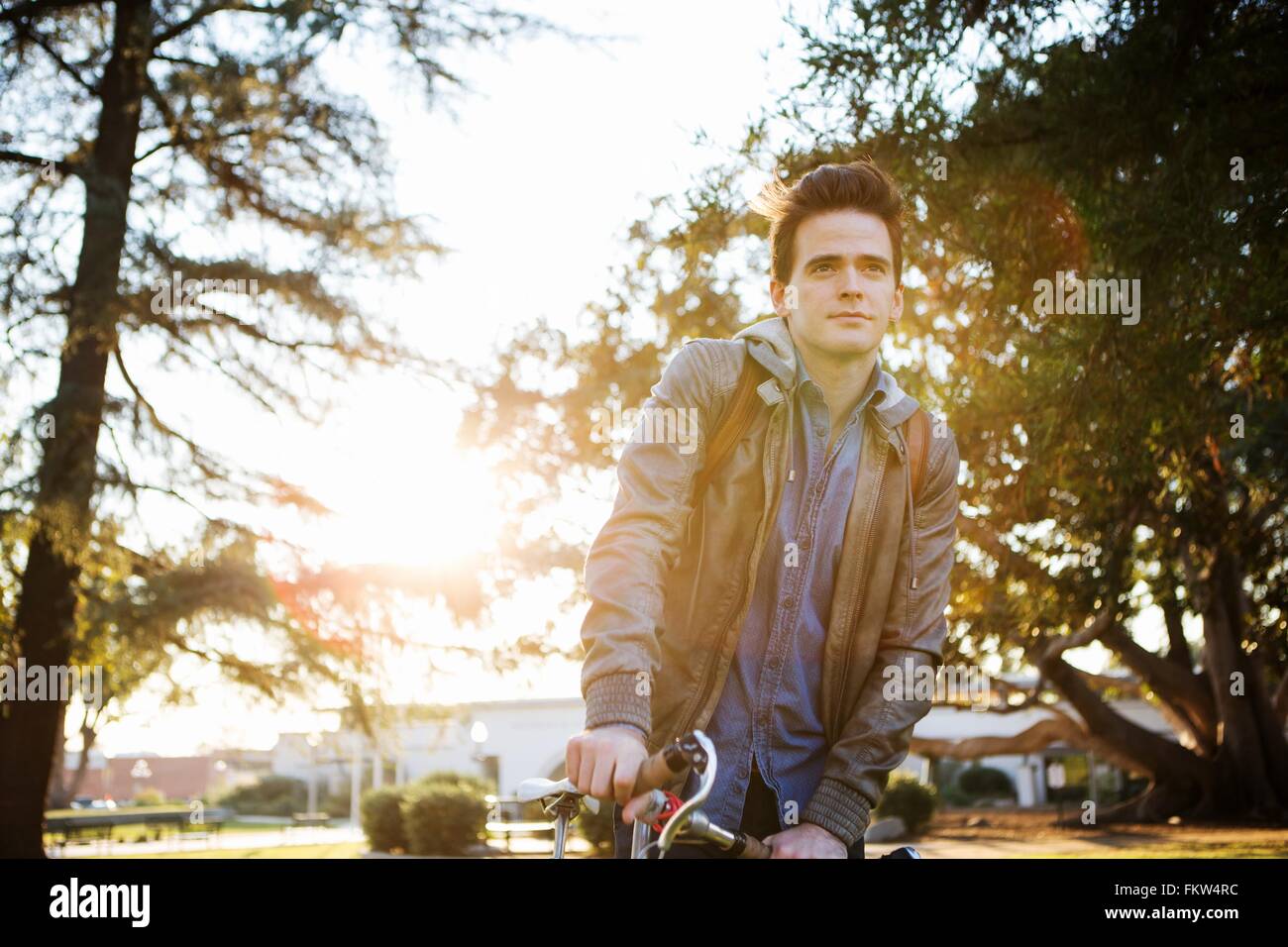Man with cycle hi-res stock photography and images - Alamy