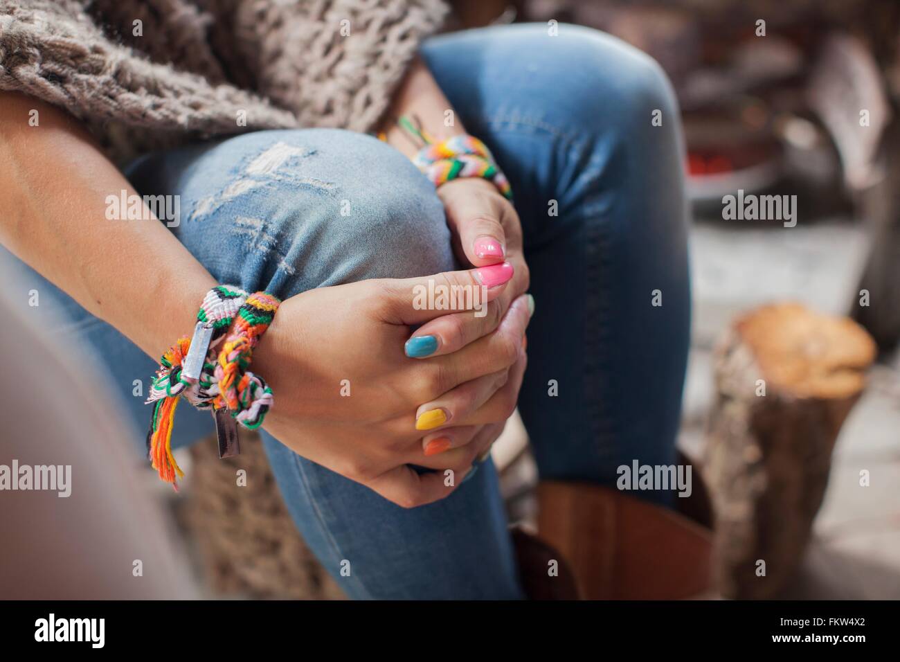 Hugging knee hi-res stock photography and images - Alamy