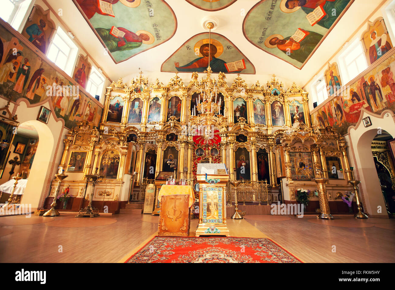 Interior of Orthodox Christian church - altar, iconostasis, and beautiful icons, frescoes in ...