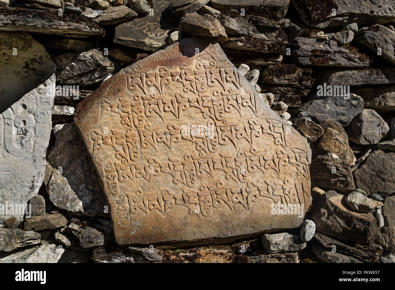 pile of stones with nepalese symbols on them Stock Photo - Alamy