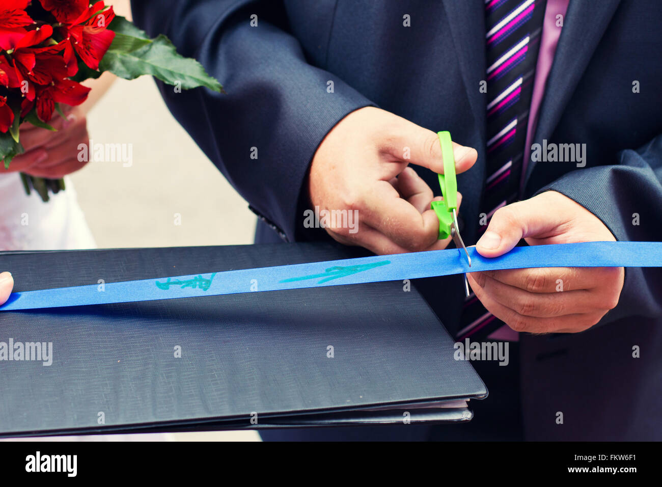 festive opening. Cutting of a ribbon Stock Photo - Alamy