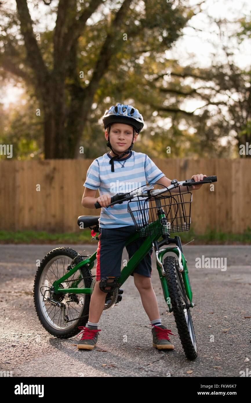 Boy on bicycle wearing helmet hi-res stock photography and images - Alamy