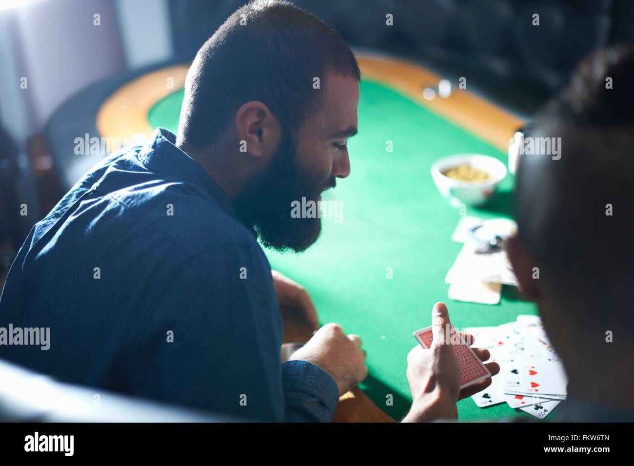 Two men playing cards hi-res stock photography and images - Alamy