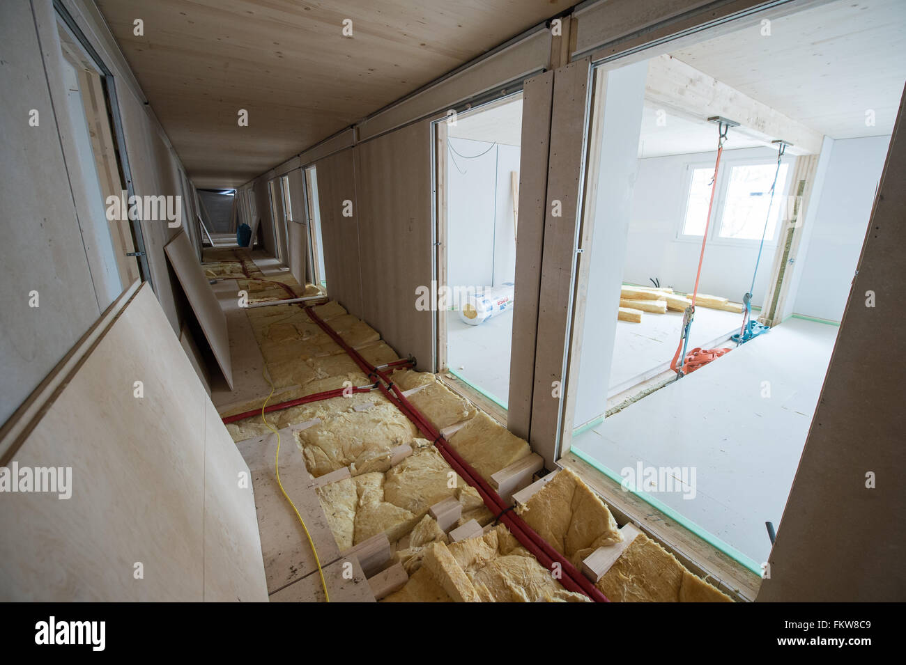 The construction site of a future refugee shelter built as a wooden ...