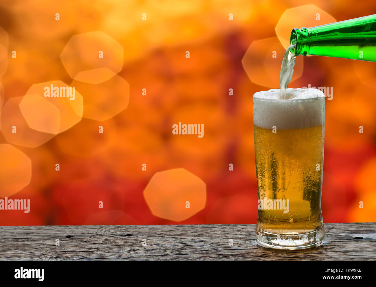Enjoy beer in night club Stock Photo - Alamy