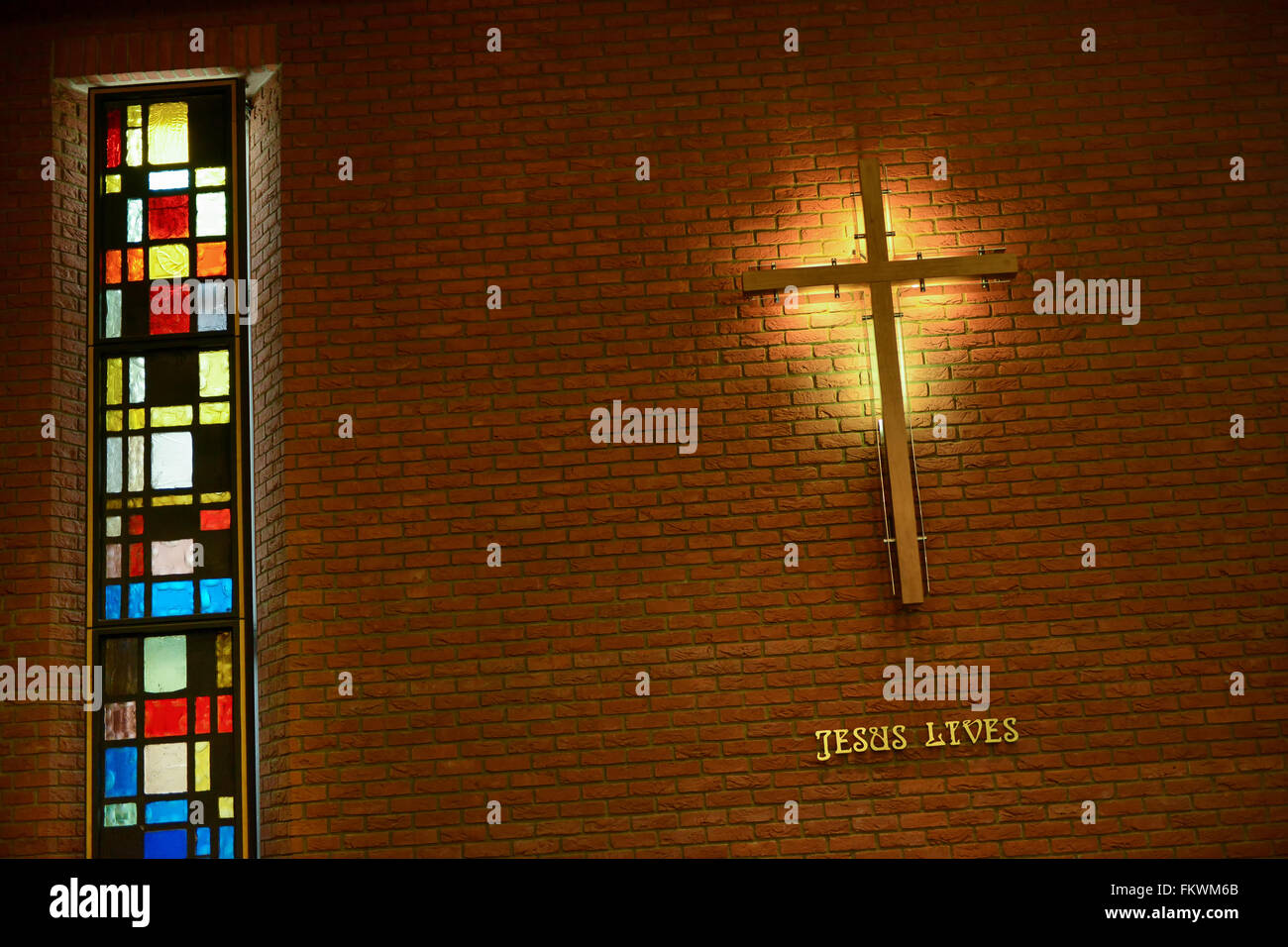Cross inside church stained glass hi-res stock photography and images ...