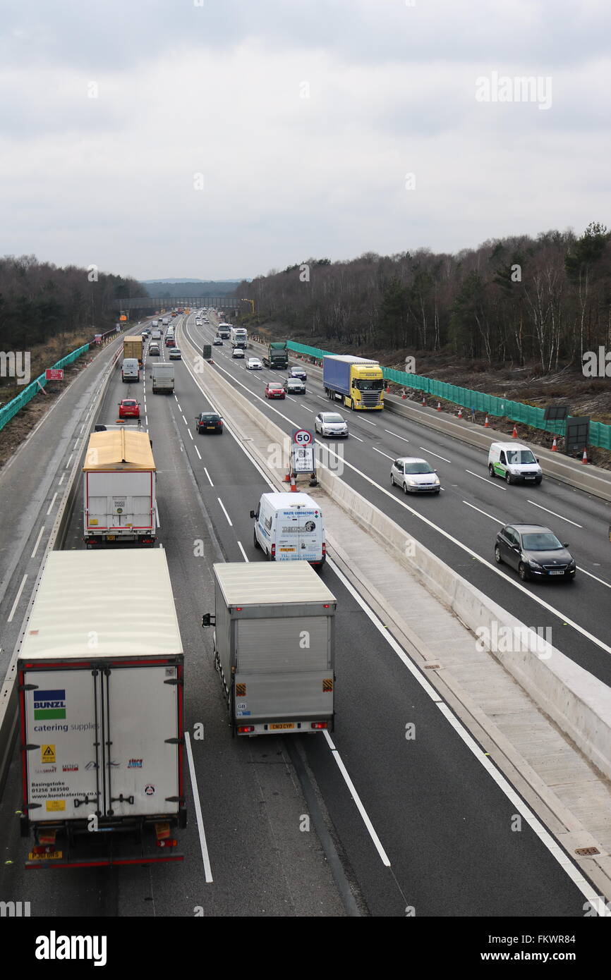 Traffic on the M3 heading out of London, through the roadworks Stock ...