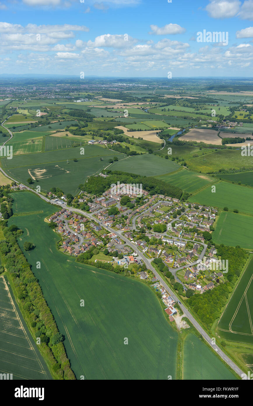 An aerial view of the village of Cross Houses and surrounding ...
