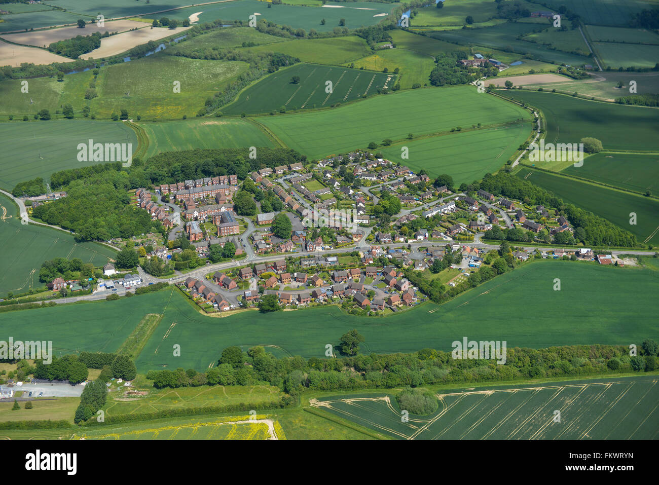 An aerial view of the village of Cross Houses and surrounding ...