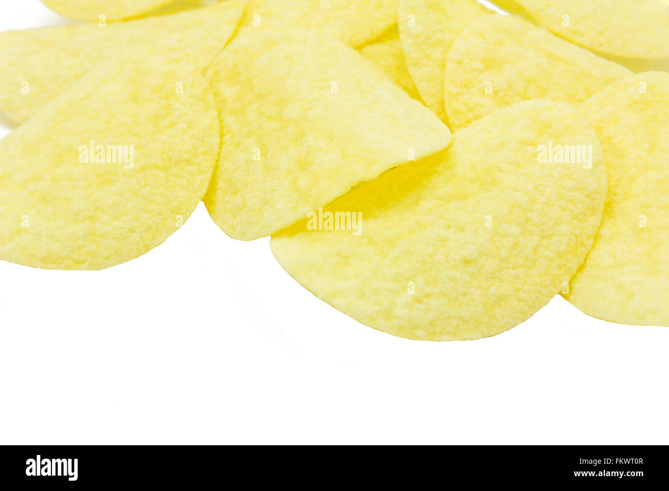Potato chips on a white background Stock Photo - Alamy
