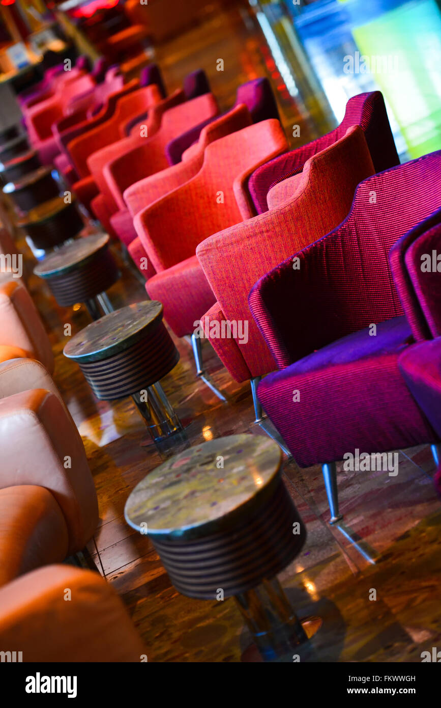 A site of tables and chairs in a bar Stock Photo - Alamy