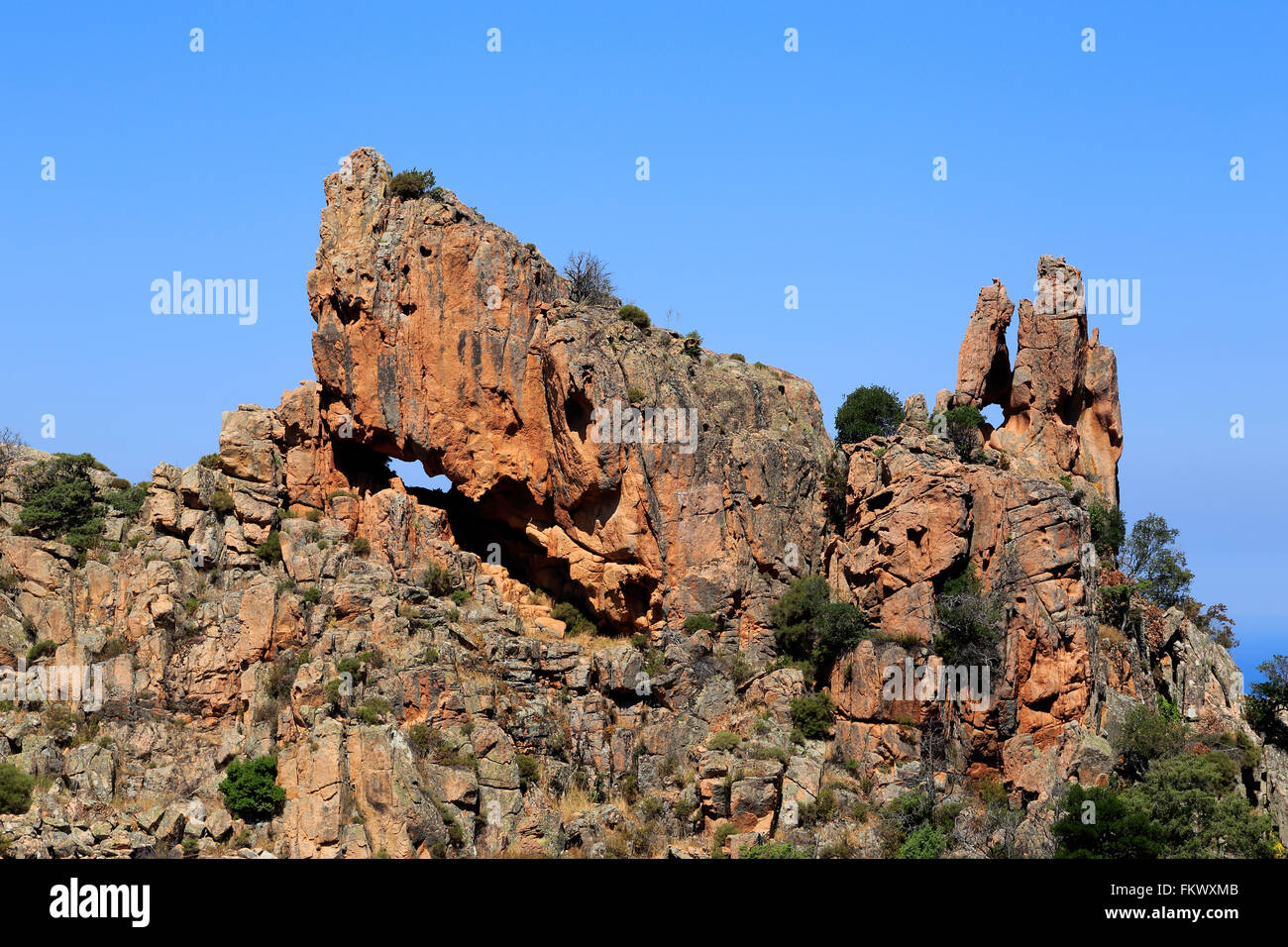 Rock carved in the shape of heart in the Calanches of Piana, Corsica ...