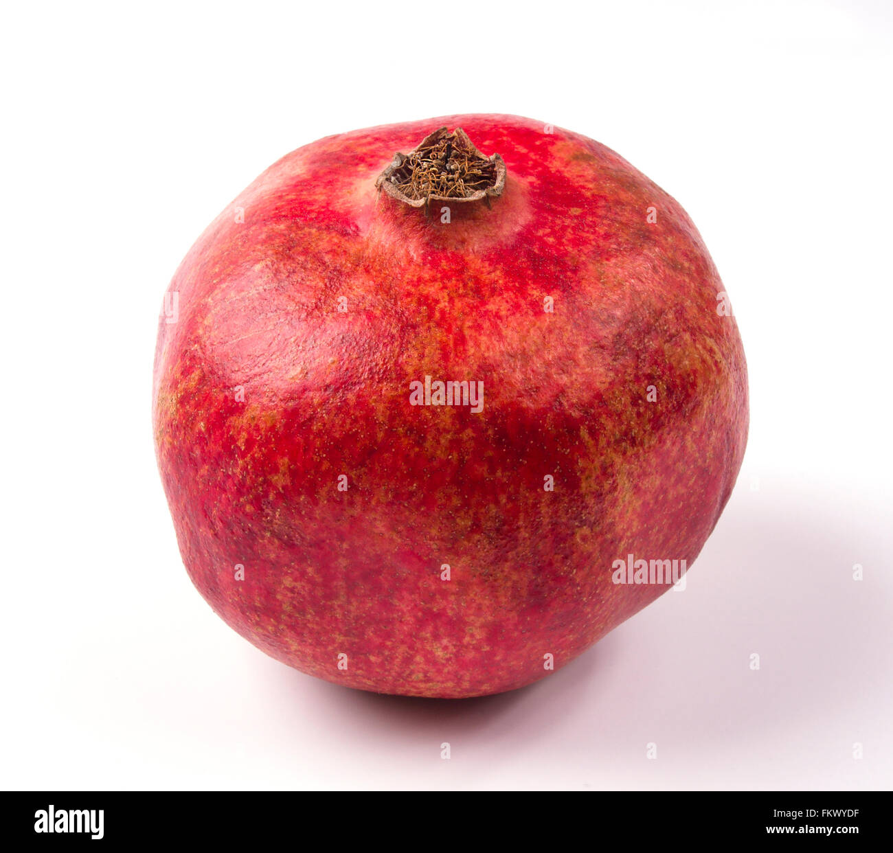 Big Pomegranate fruit on white background, closeup Stock Photo - Alamy