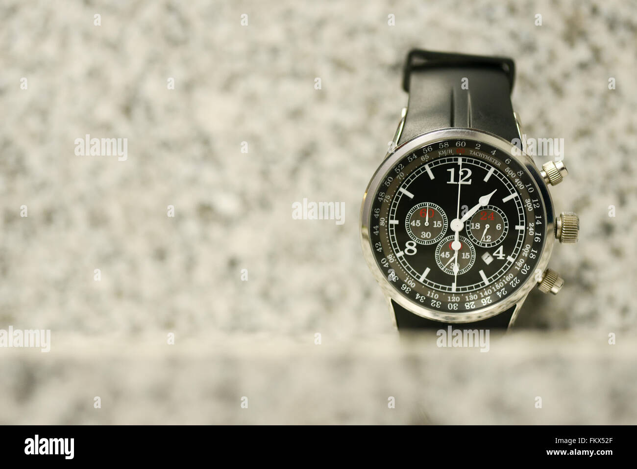 Men watch with stone background Stock Photo - Alamy