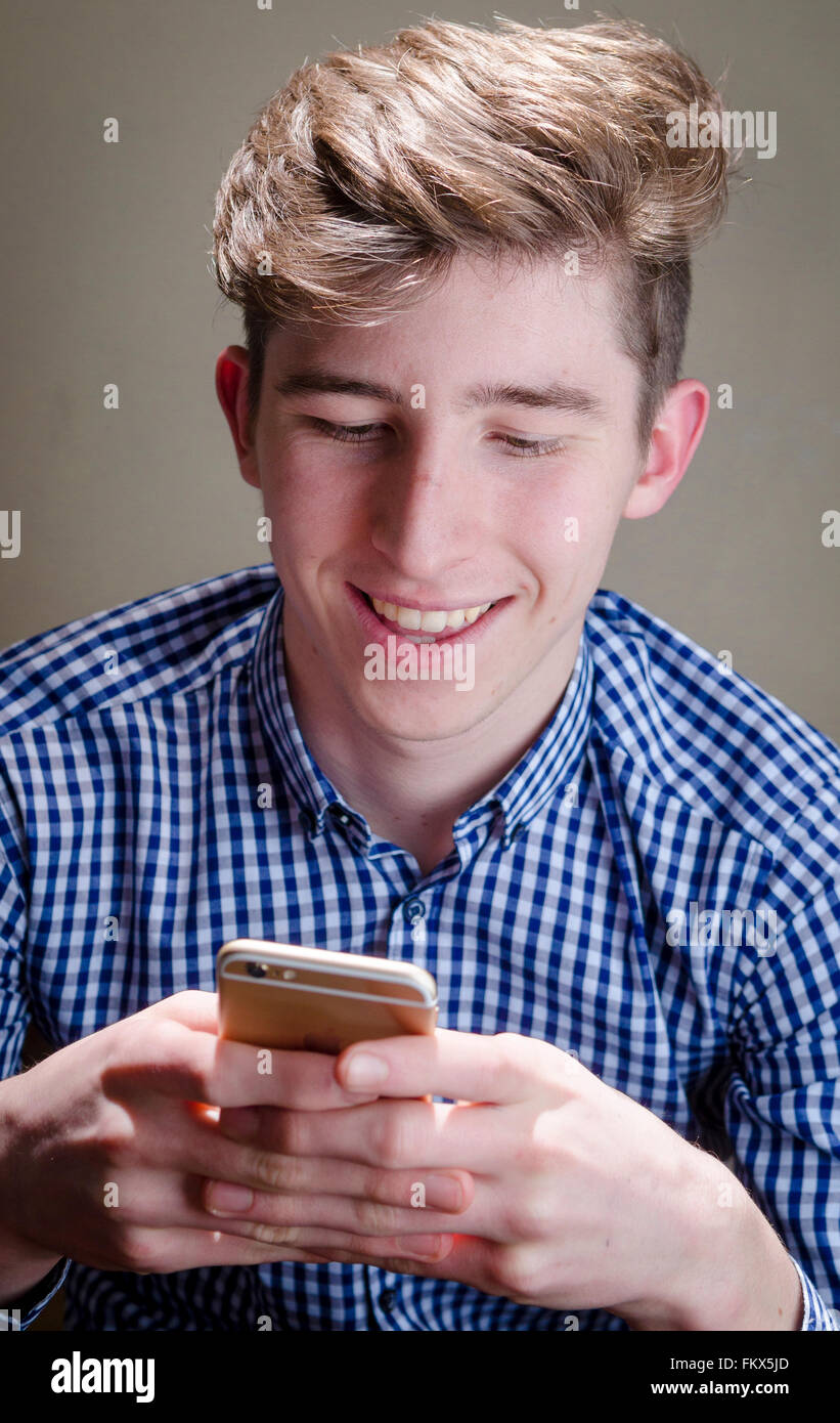 Young Man Using Smart Phone Stock Photo - Alamy
