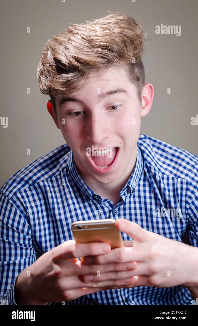 Smart phone laughing hi-res stock photography and images - Alamy