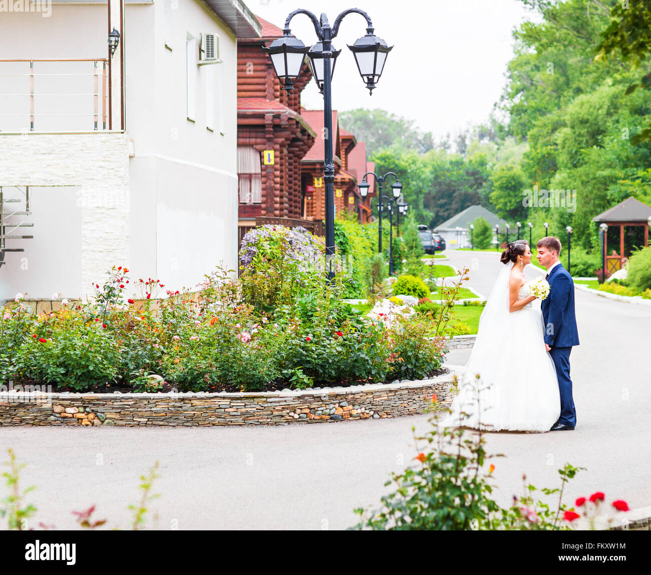 Bride and groom having a romantic moment on their wedding day Stock ...